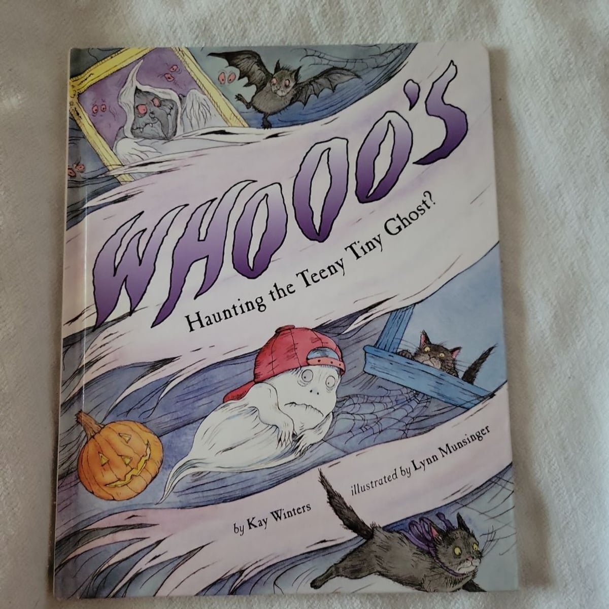 Whooo's Haunting the Teeny Tiny Ghost? by Kay Winters
