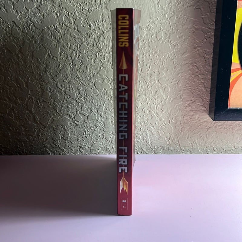 Catching Fire by Suzanne Collins , Paperback | Pangobooks