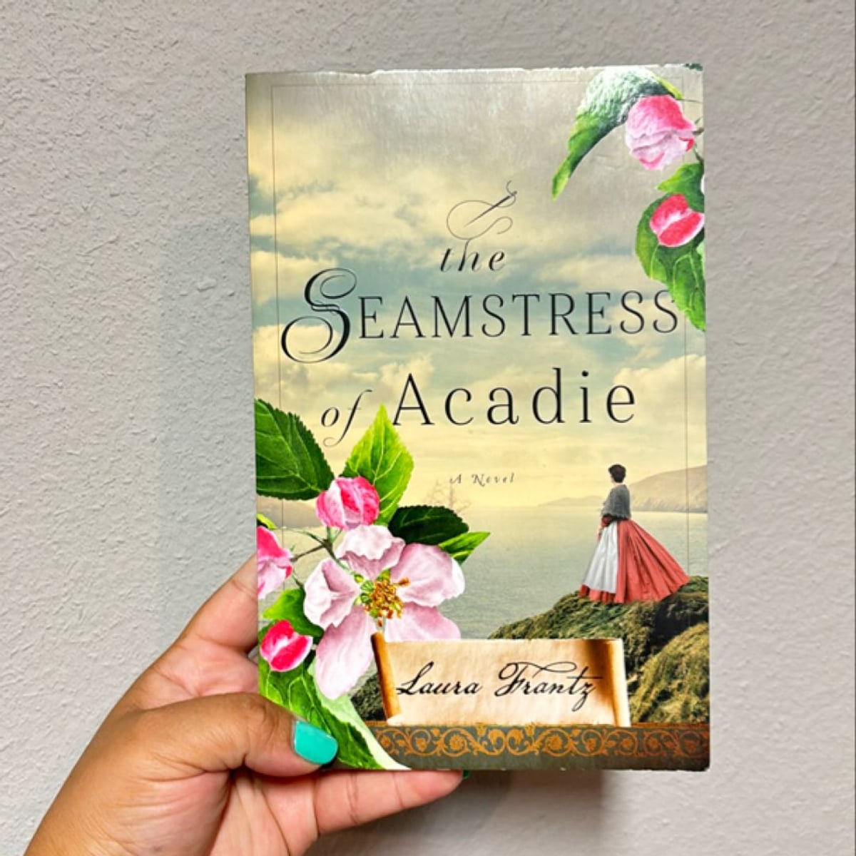The Seamstress of Acadie by Laura Frantz