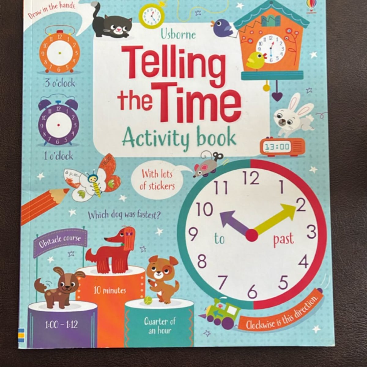 Telling the Time Activity Book by Lara Bryan