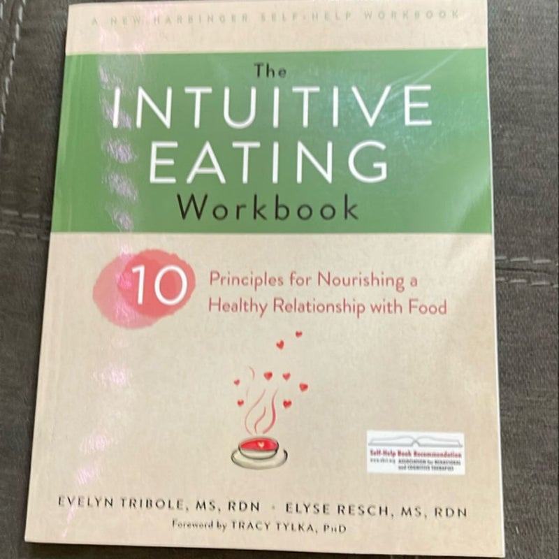 The Intuitive Eating Workbook by Evelyn Tribole, Elyse Resch, Tracy Tylka