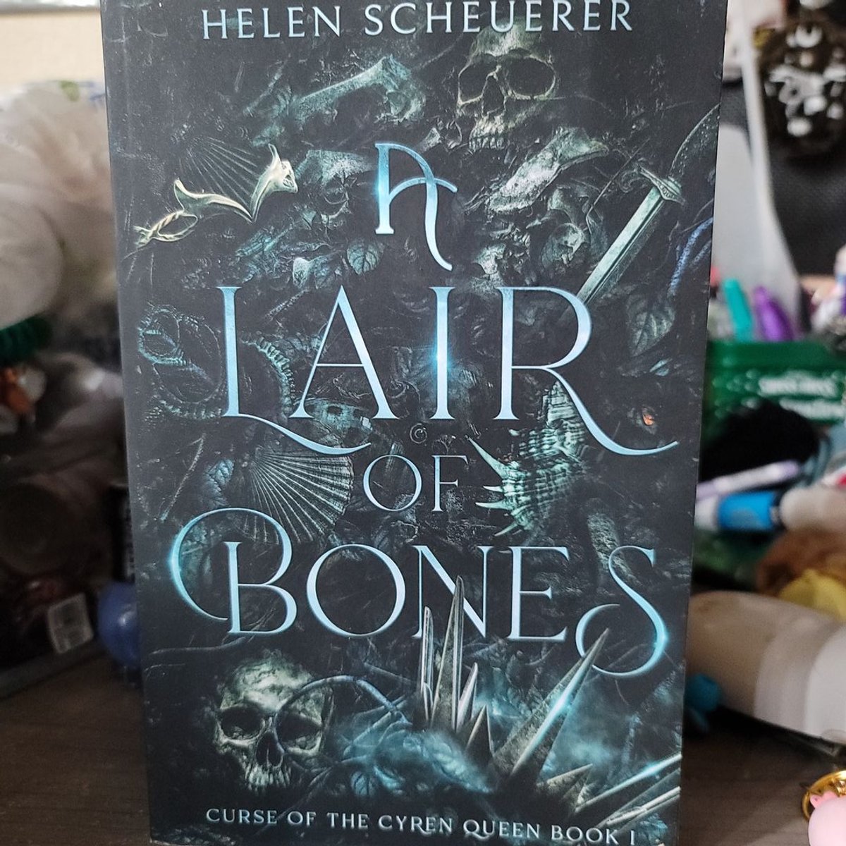 A Lair of Bones by Helen Scheuerer