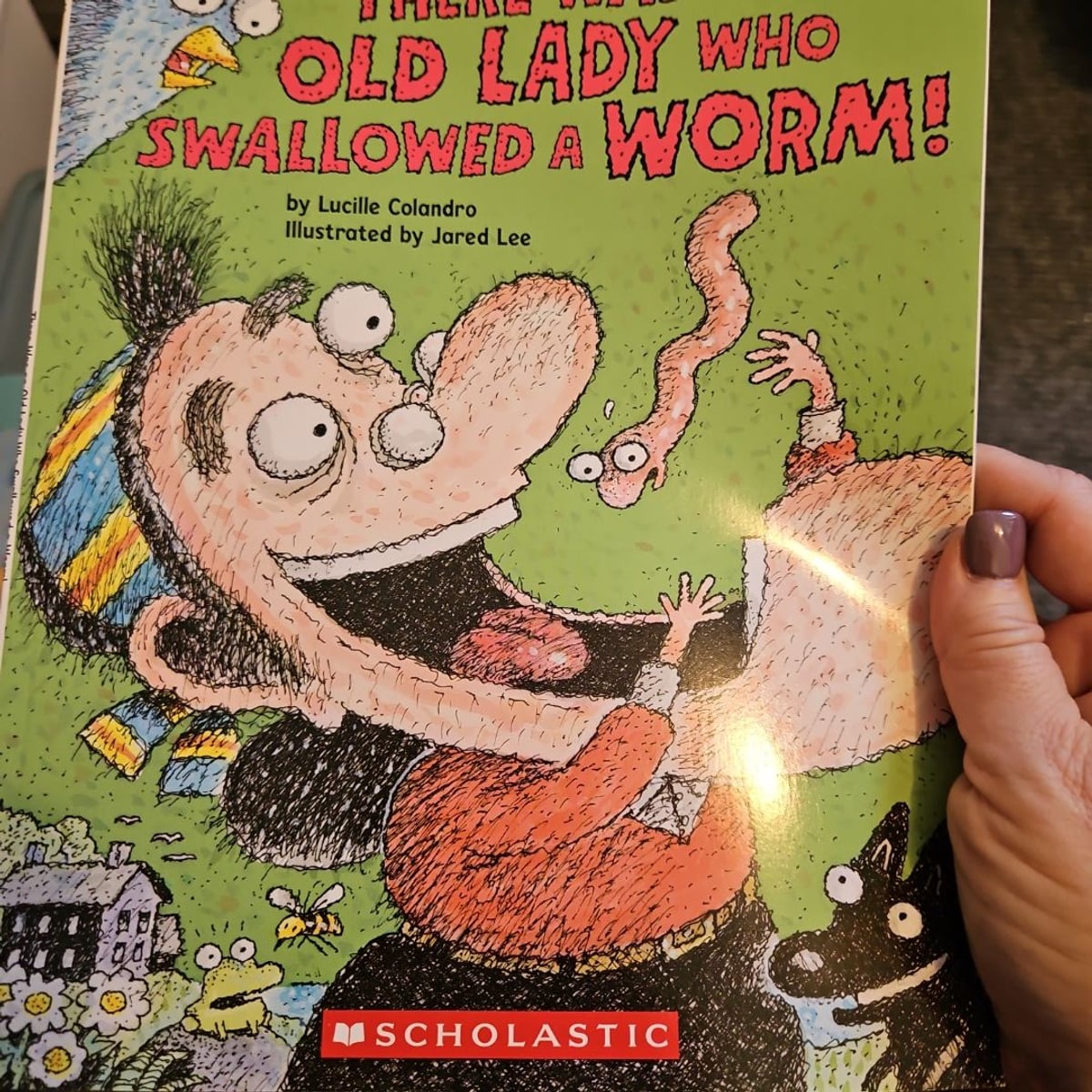 There Was an Old Lady Who Swallowed a Worm! by Lucille Colandro