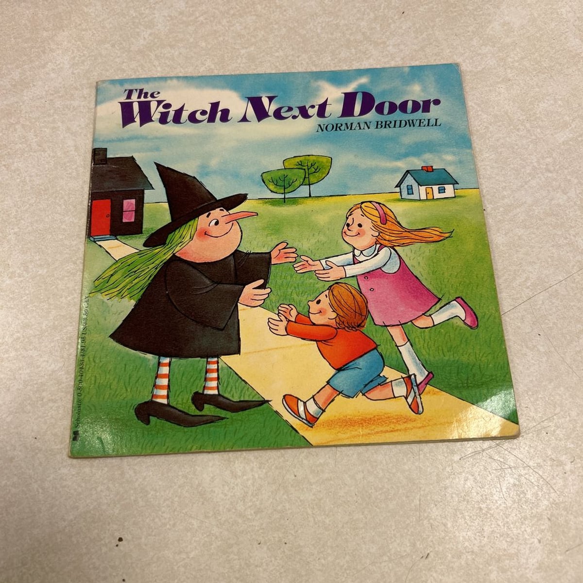 The witch next door by Norman Bridwell, Paperback | Pangobooks