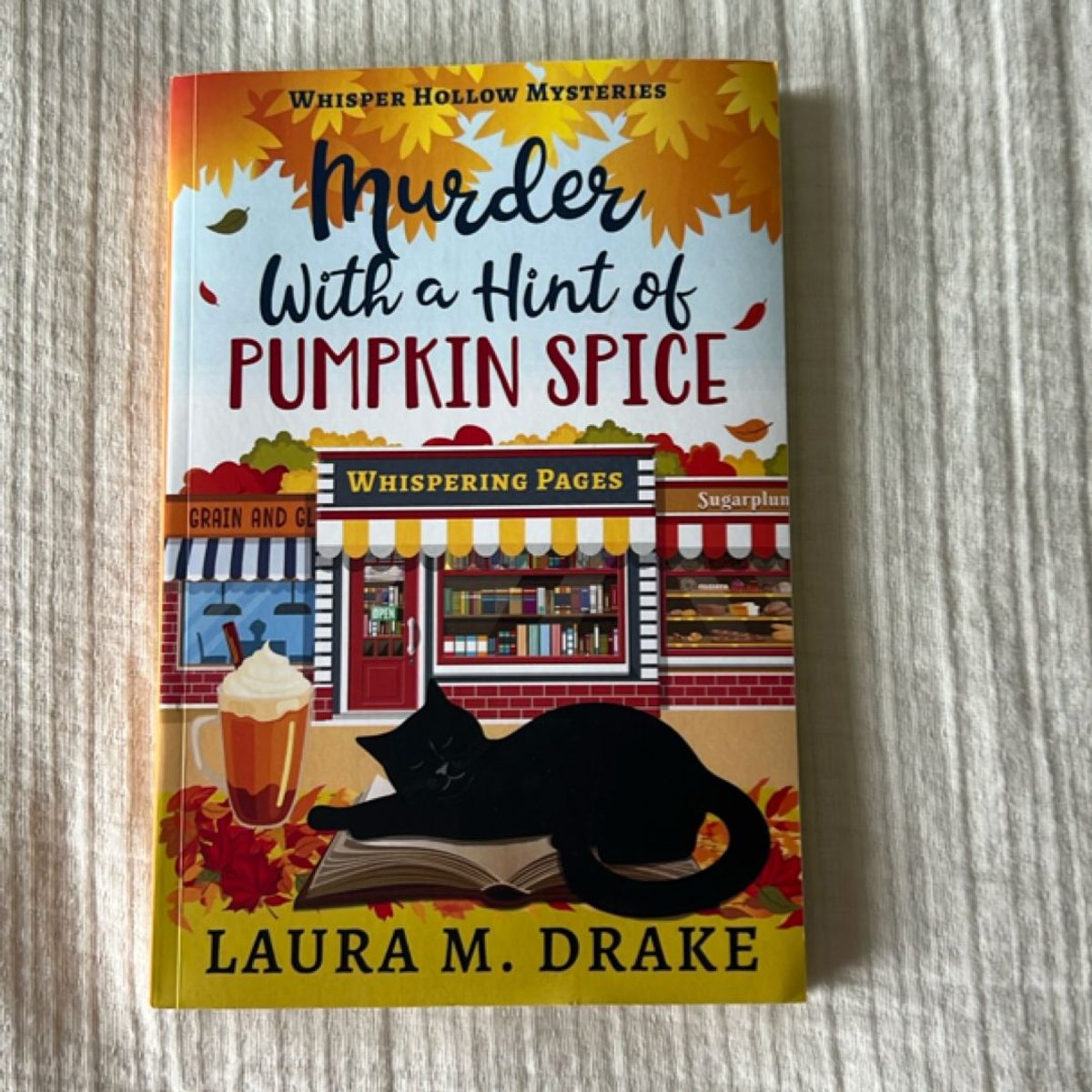 Murder with a Hint of Pumpkin Spice by Laura Drake