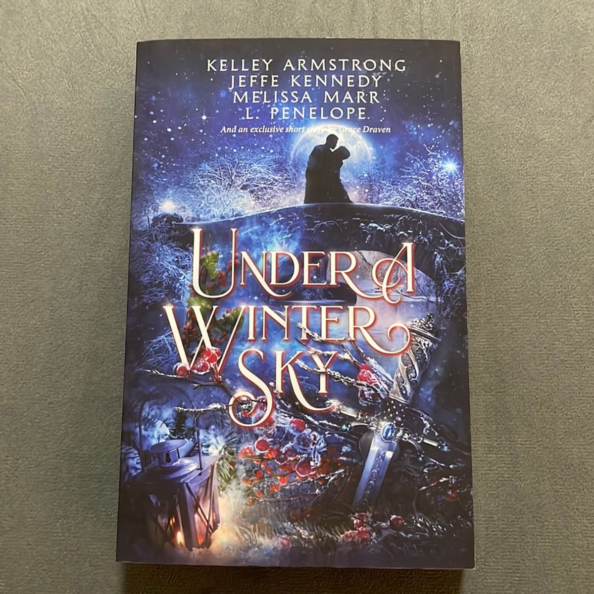 Under a Winter Sky by Jeffe Kennedy, Melissa Marr, Kelley Armstrong, L ...