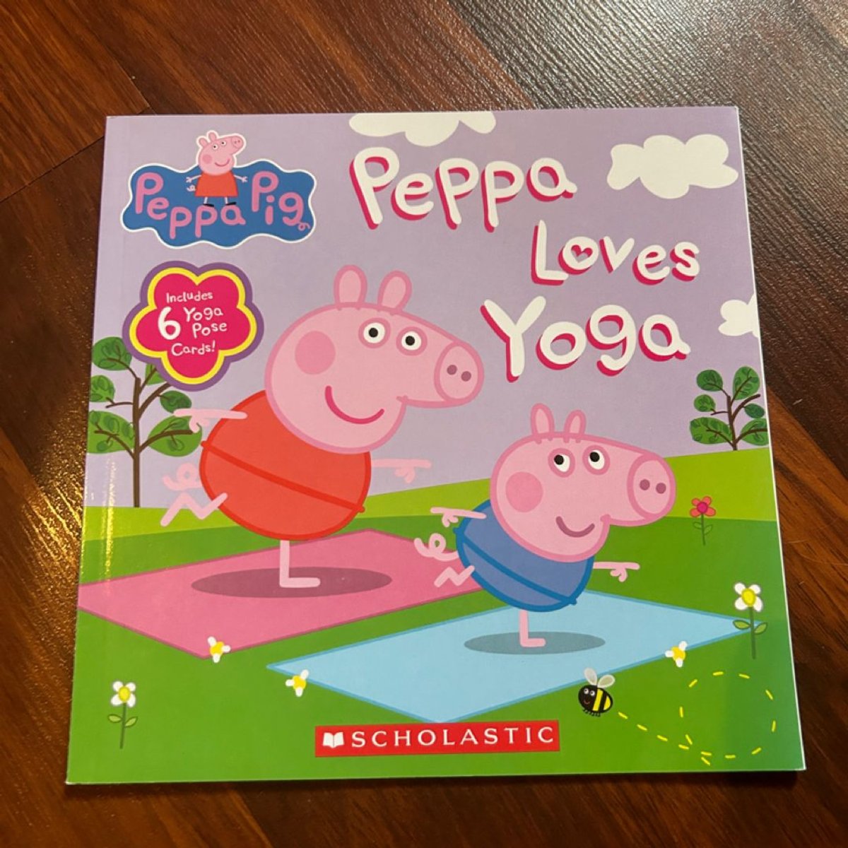 Peppa Loves Yoga (Peppa Pig) by Scholastic, Lauren Holowaty