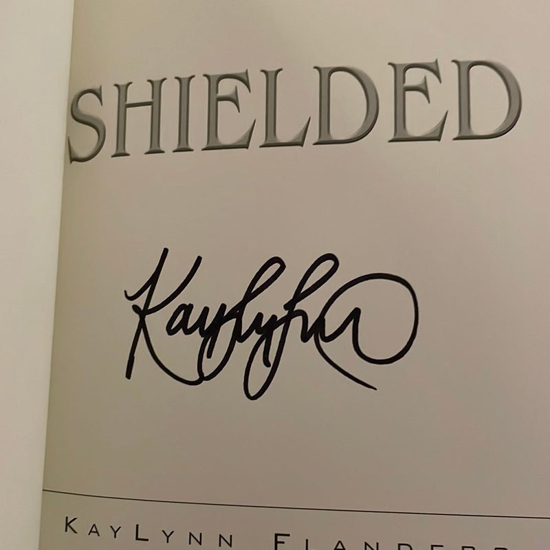 Signed: Shielded by Kaylynn Flanders, Hardcover | Pangobooks