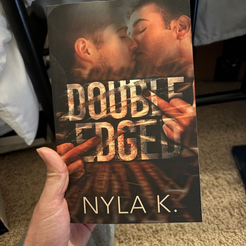 Double-Edged by Nyla K