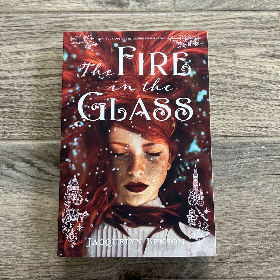 The Fire in the Glass by Jacquelyn Benson
