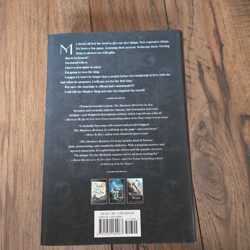 The Shadows Between Us by Tricia levenseller, Hardcover | Pangobooks