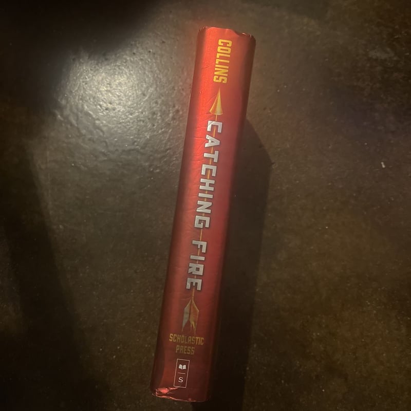 Catching Fire by Suzanne Collins, Hardcover | Pangobooks