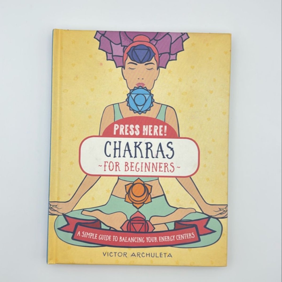 Press Here! Chakras for Beginners by Victor Archuleta