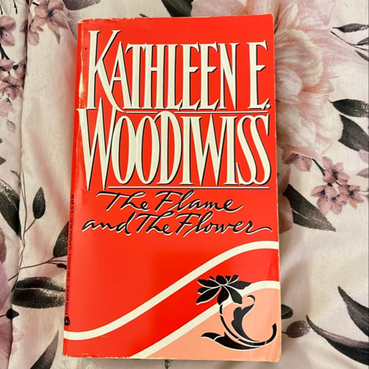 The Flame and the Flower by Kathleen E. Woodiwiss