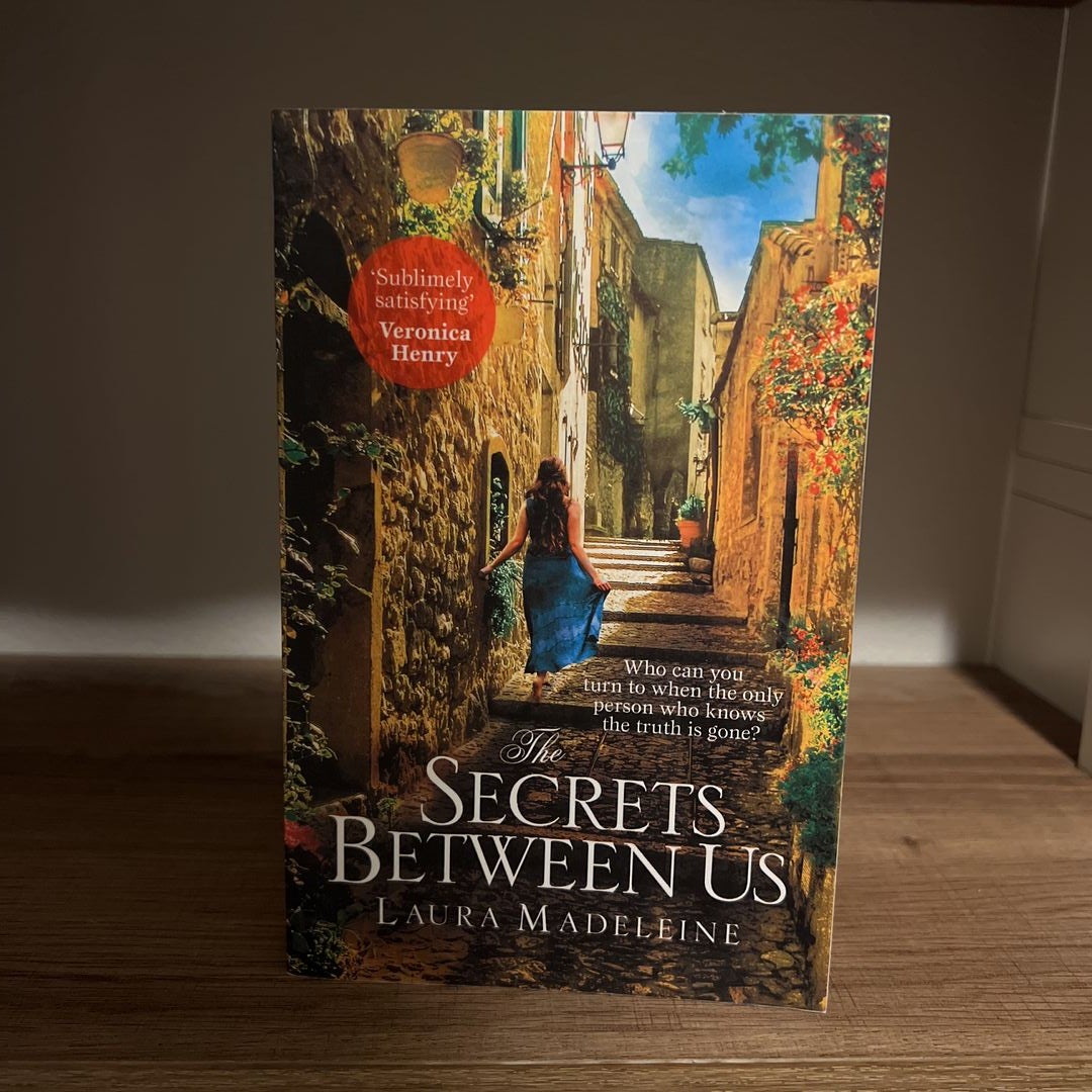 The Secrets Between Us by Laura Madeleine