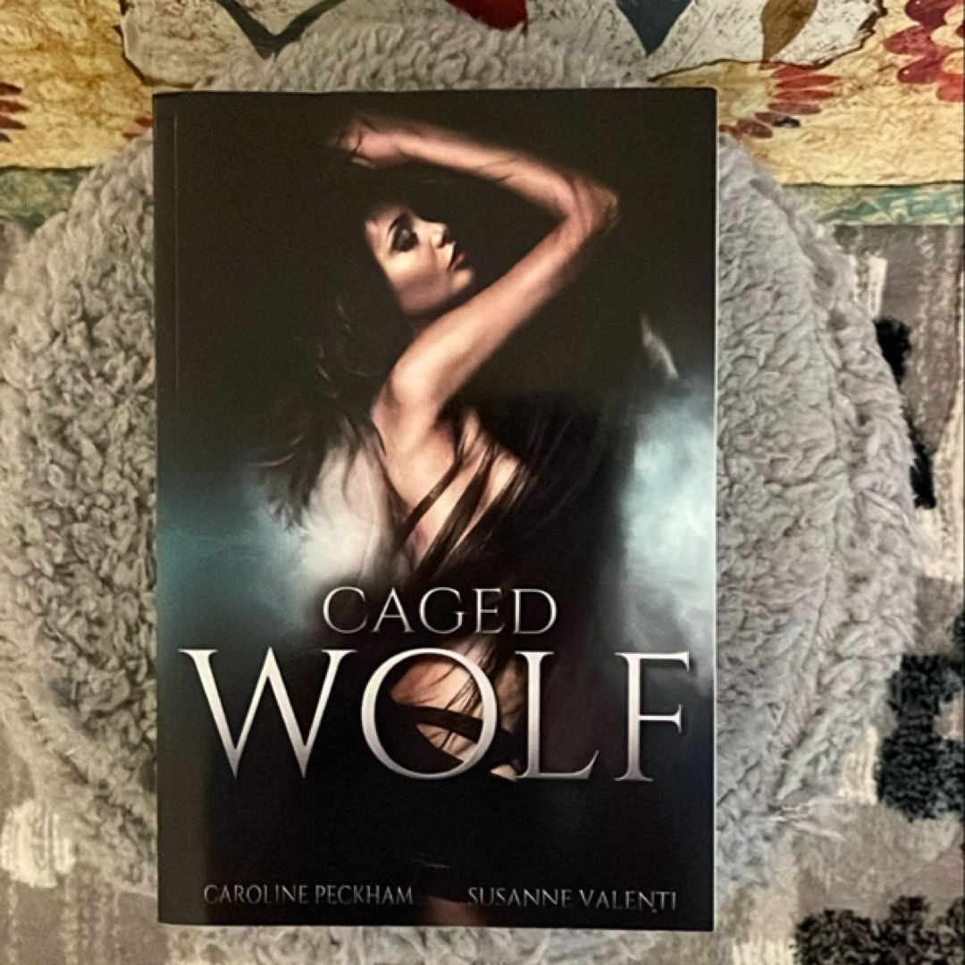 Caged Wolf by Susanne Valenti, Caroline Peckham