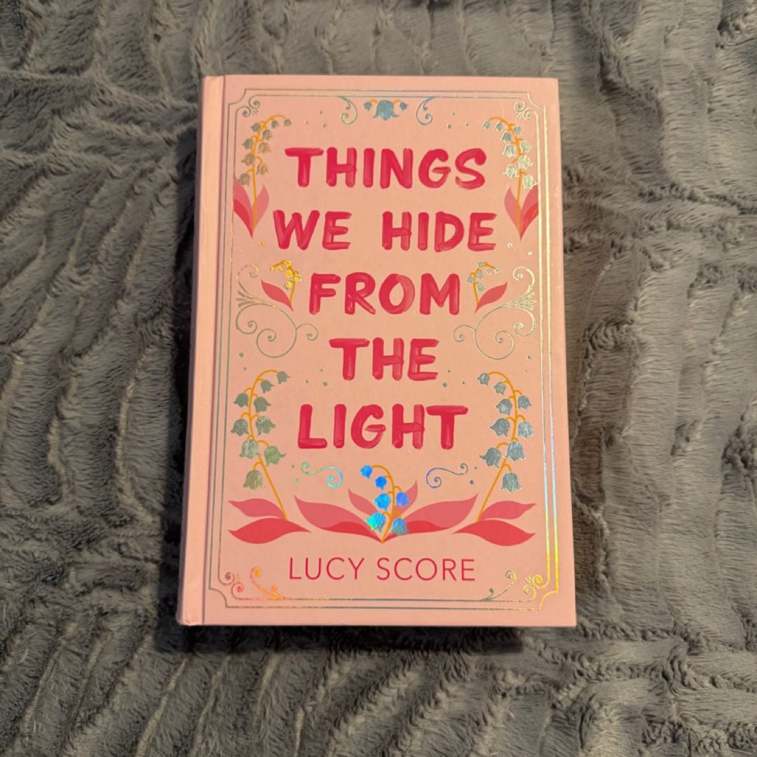 Things We Hide from the Light by Lucy Score, Hardcover | Pangobooks