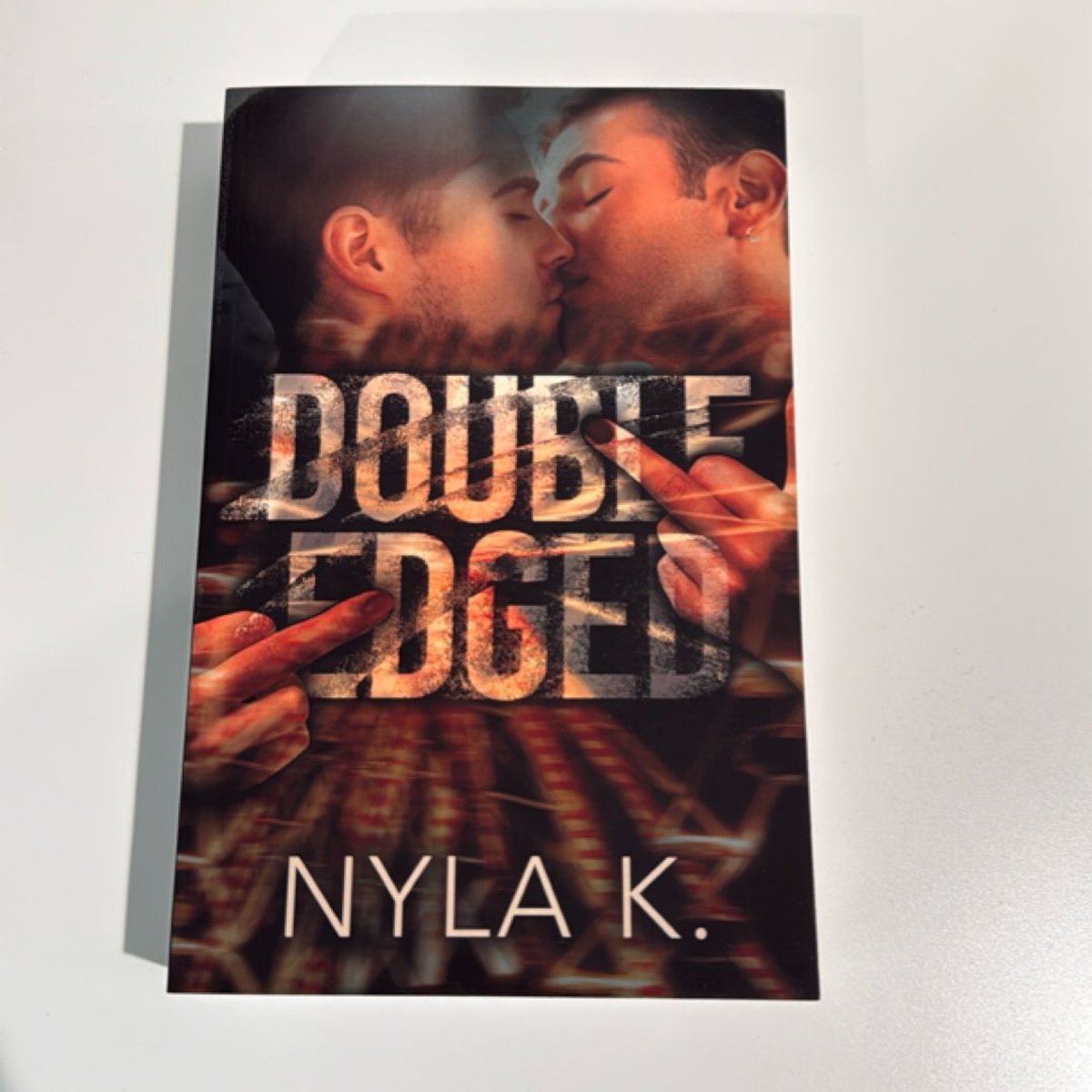 Double-Edged by Nyla K