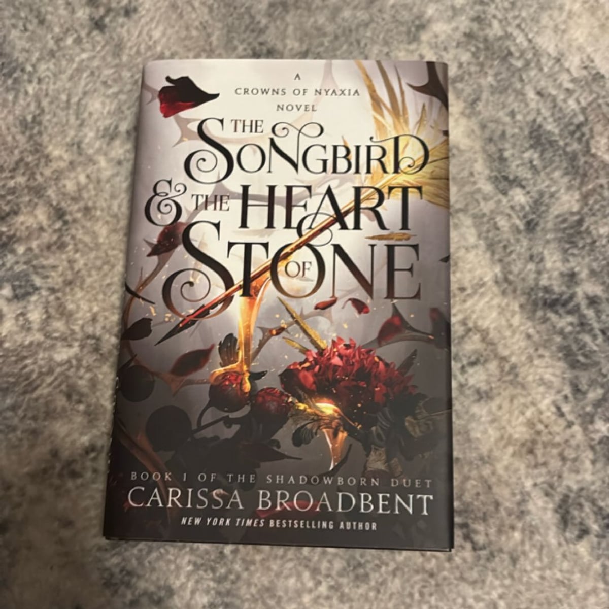 The Songbird and the Heart of Stone by Carissa Broadbent, Hardcover ...