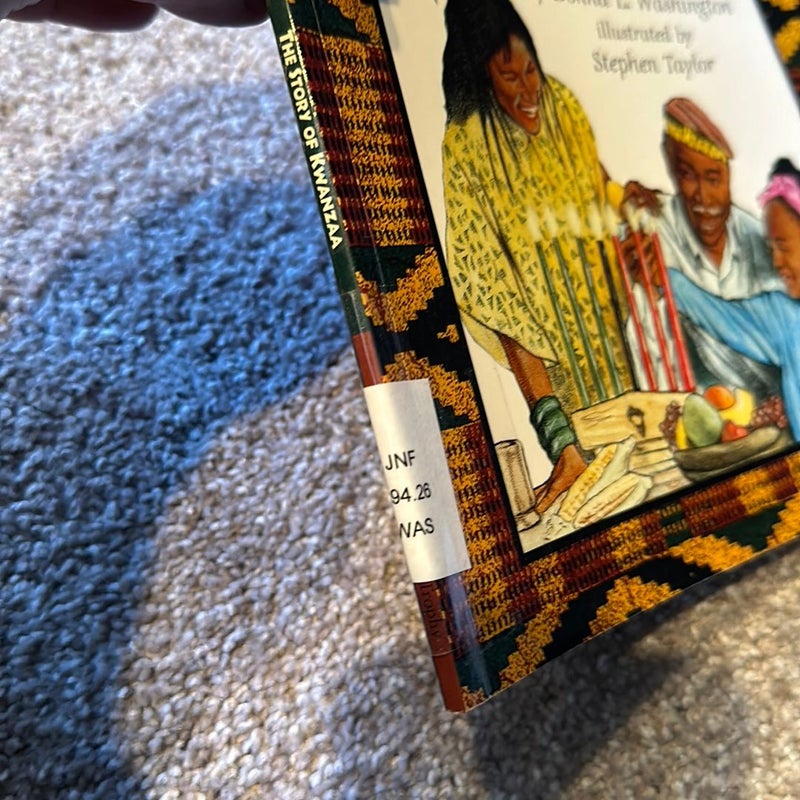 The Story of Kwanzaa by Donna L. Washington