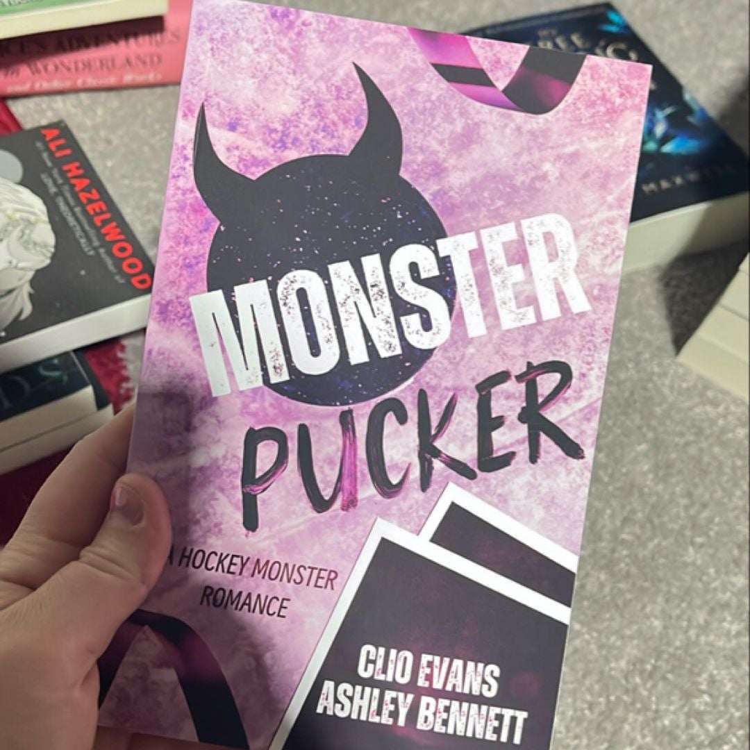 Monster Pucker: a MMF Monster Hockey Romance by Ashley Bennett, Clio Evans