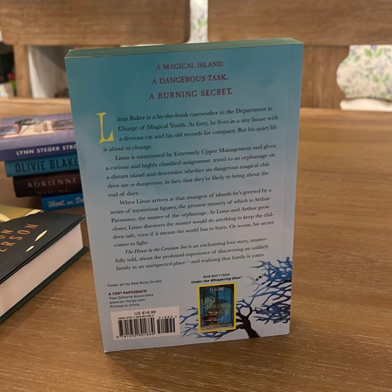 The House in the Cerulean Sea by TJ Klune, Paperback | Pangobooks