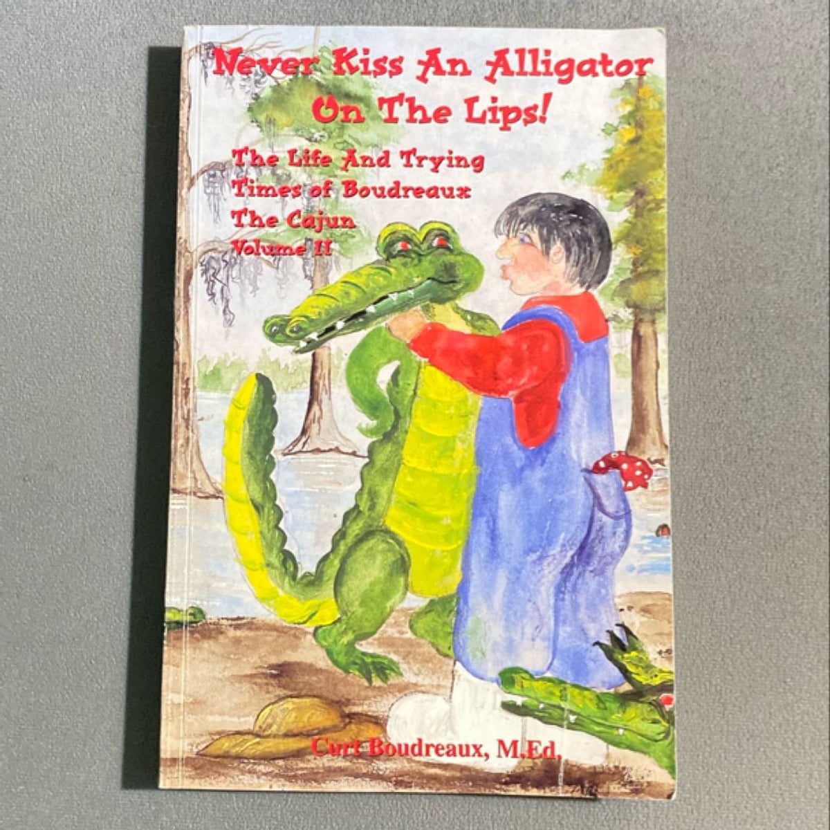 Never Kiss an Alligator on the Lips! by Curt Boudreaux