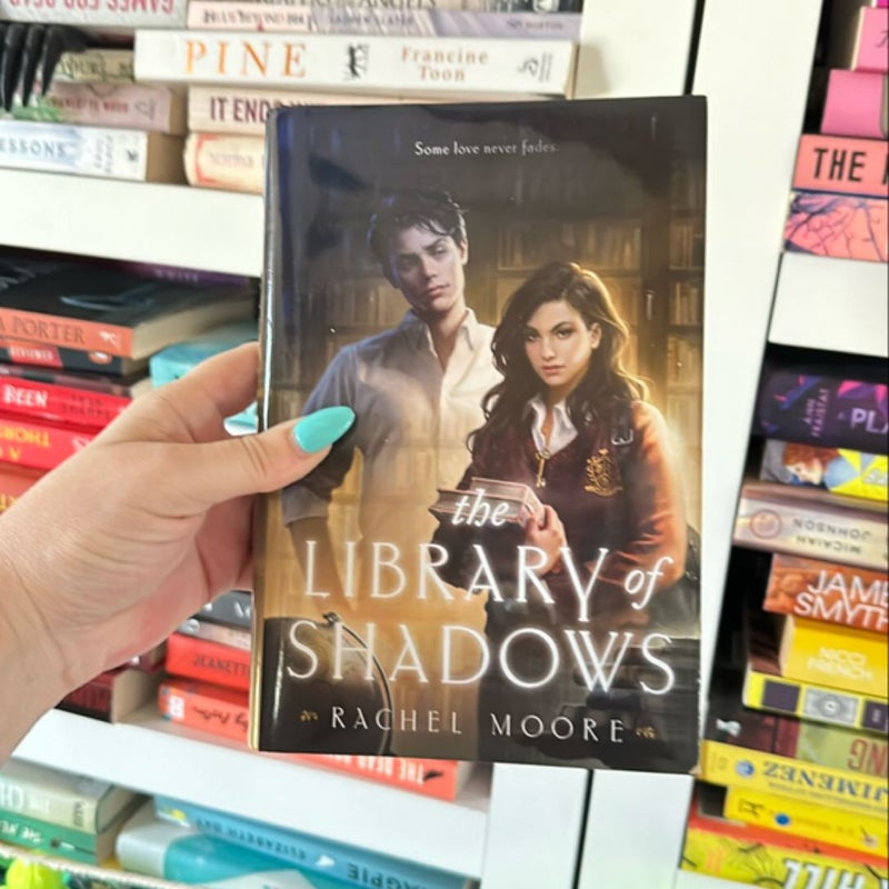 The Library of Shadows by Rachel Moore