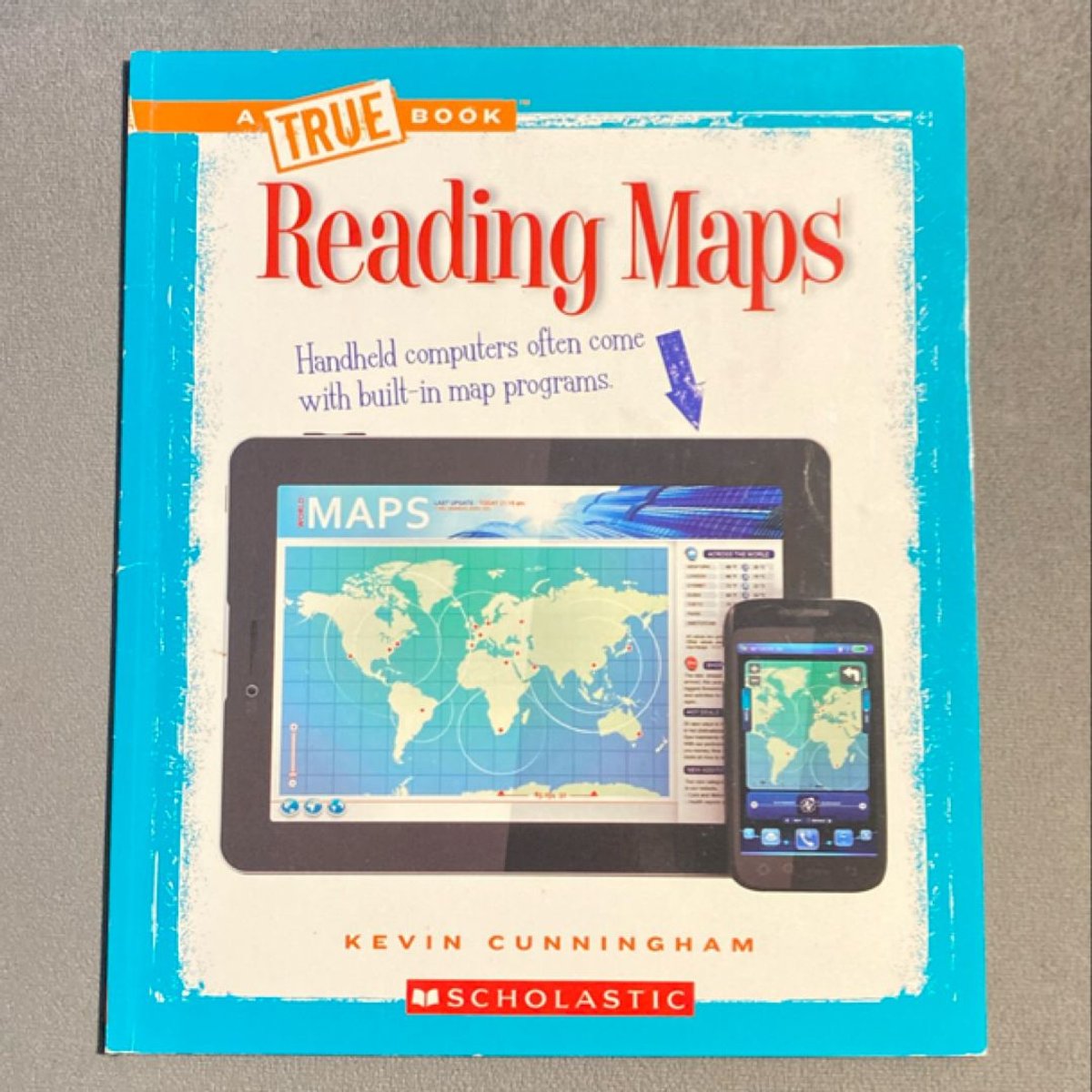 Reading Maps (a True Book: Information Literacy) by Kevin Cunningham