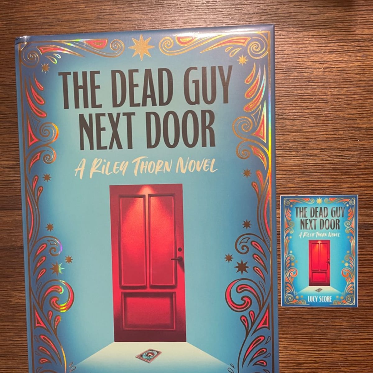 Bookish Box The Dead Guy Next Door by Lucy Score, Hardcover | Pangobooks