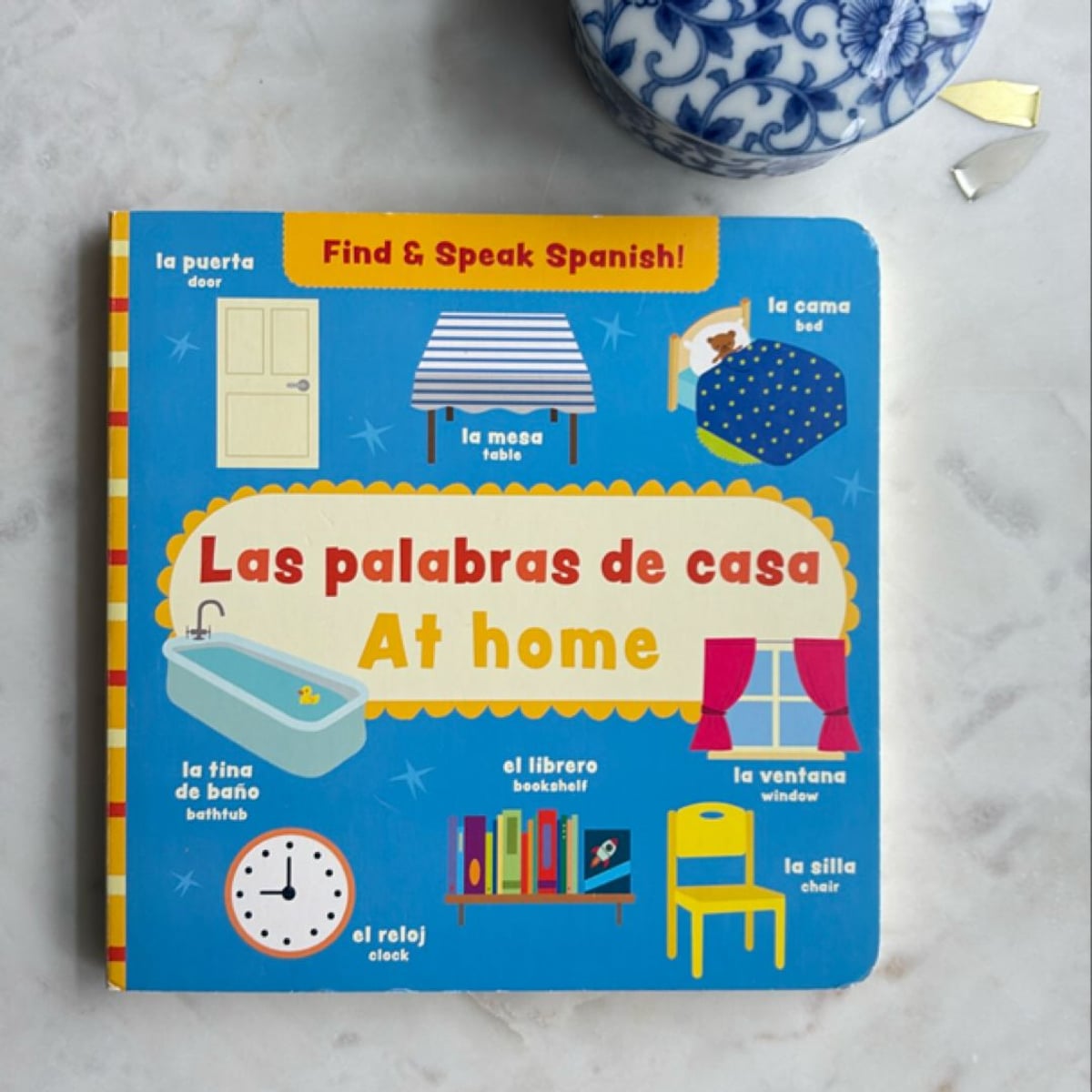 At Home / Las Palabras de Casa by Sam Hutchinson