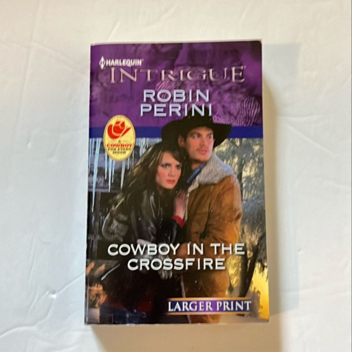 Cowboy in the Crossfire by Robin Perini