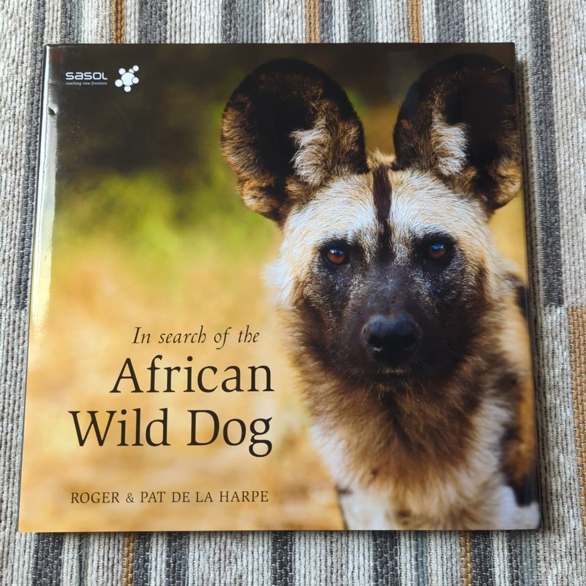 In Search of the African Wild Dog by Roger de La Harpe, Pat de la Harpe
