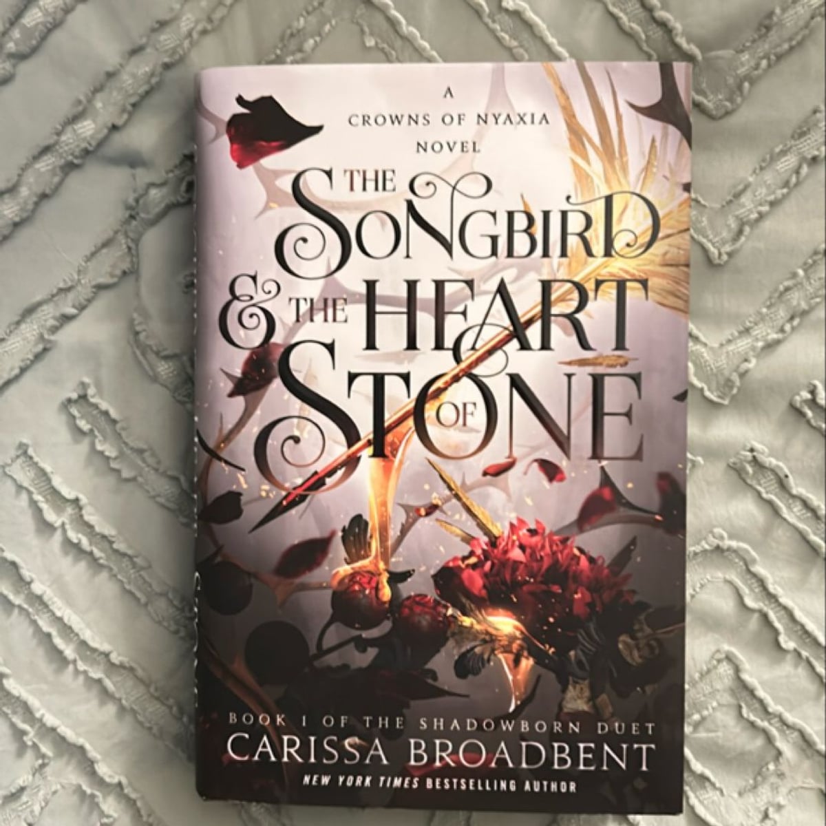 The Songbird and the Heart of Stone by Carissa Broadbent, Hardcover ...