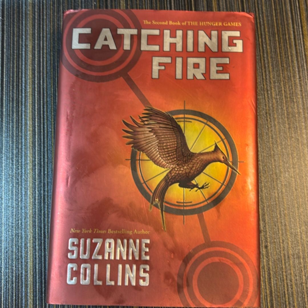 Catching Fire by Suzanne Collins, Hardcover | Pangobooks