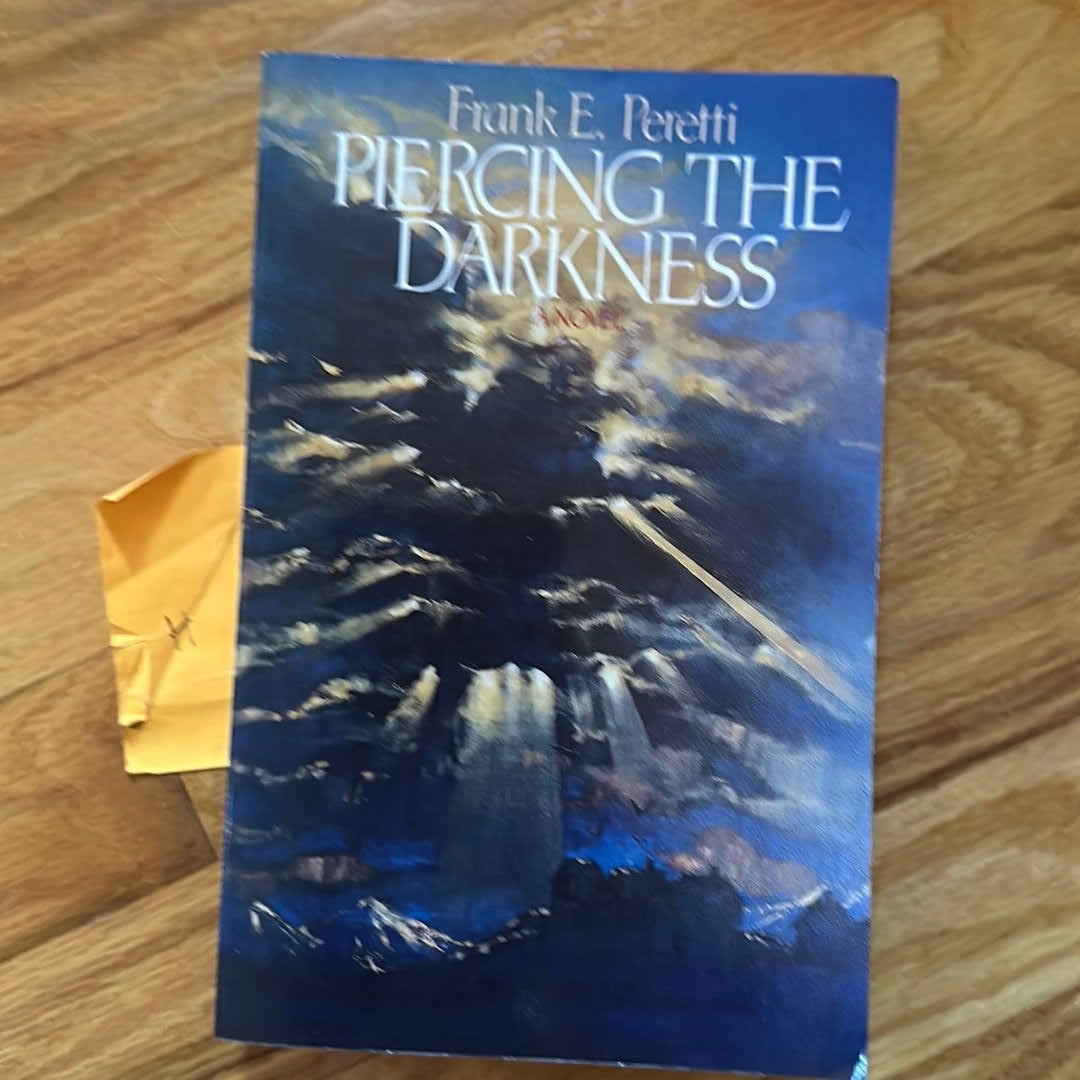 Piercing the Darkness by Frank E. Peretti, Paperback | Pangobooks