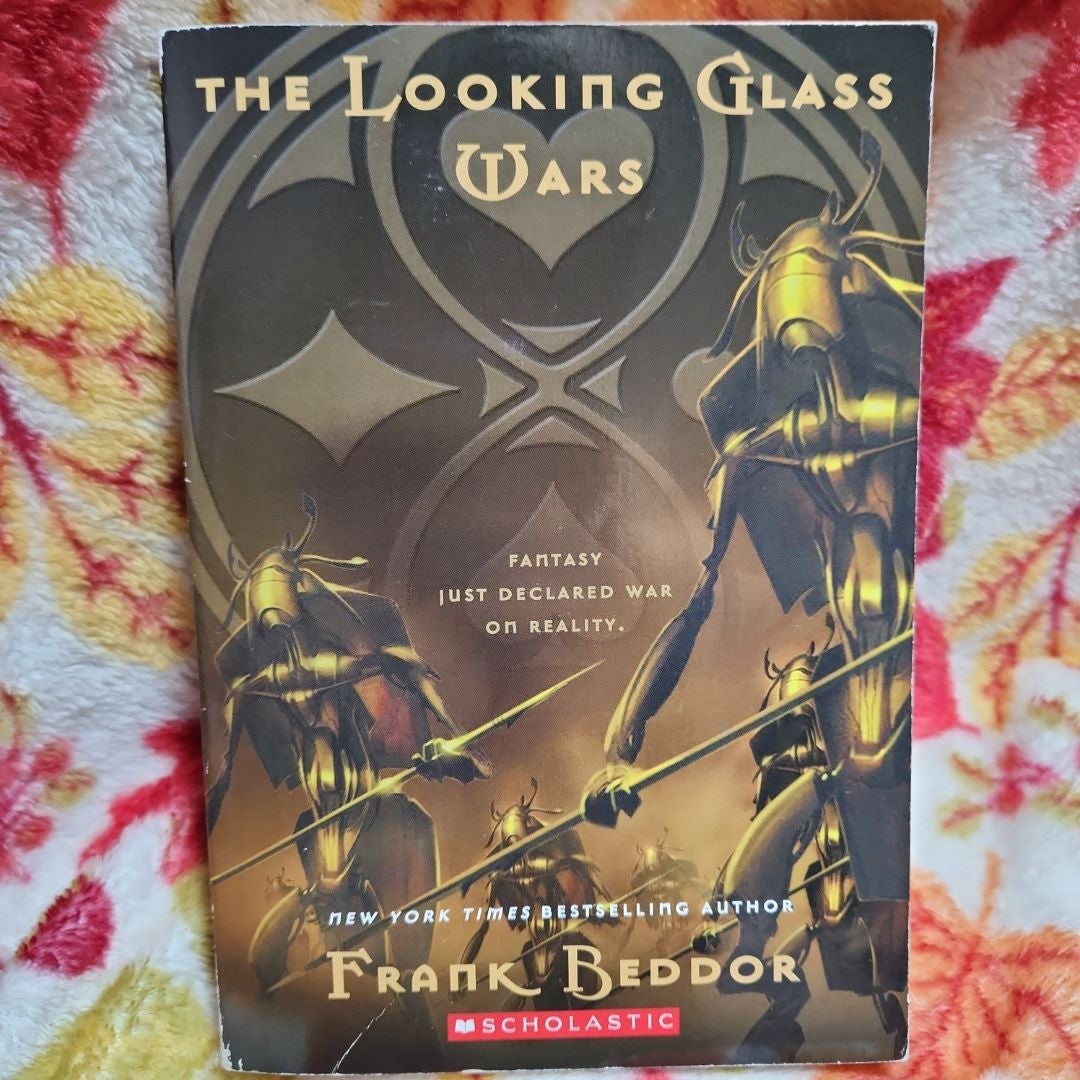 The Looking Glass Wars by Frank Beddor, Paperback | Pangobooks