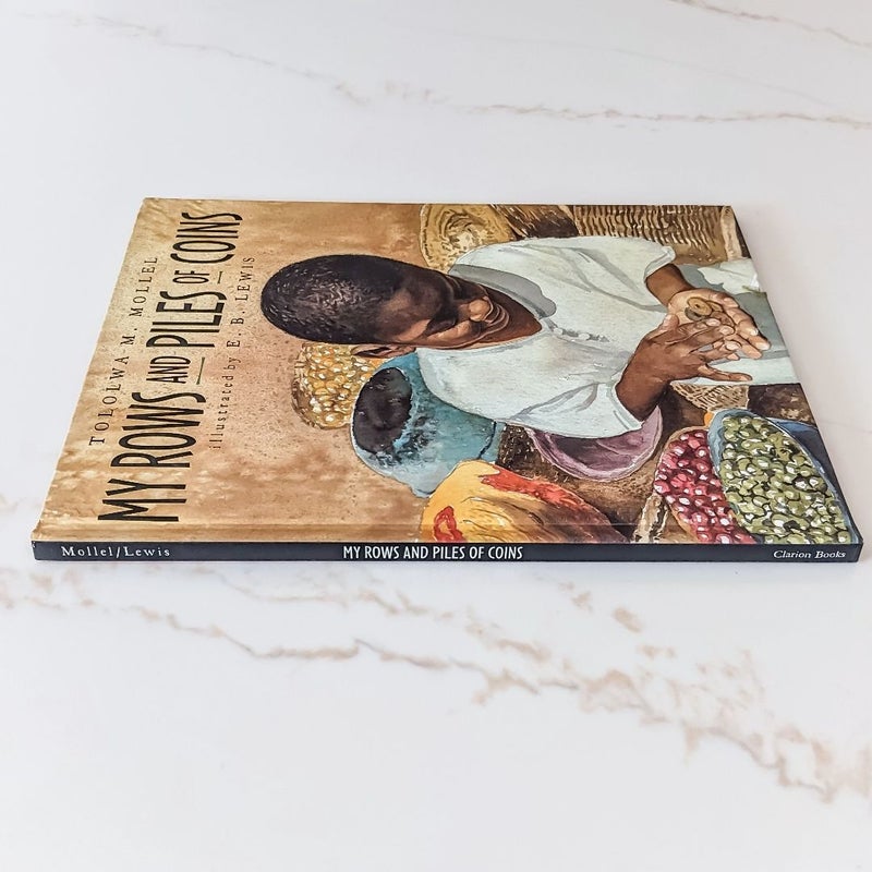 My Rows and Piles of Coins by Tololwa M. Mollel