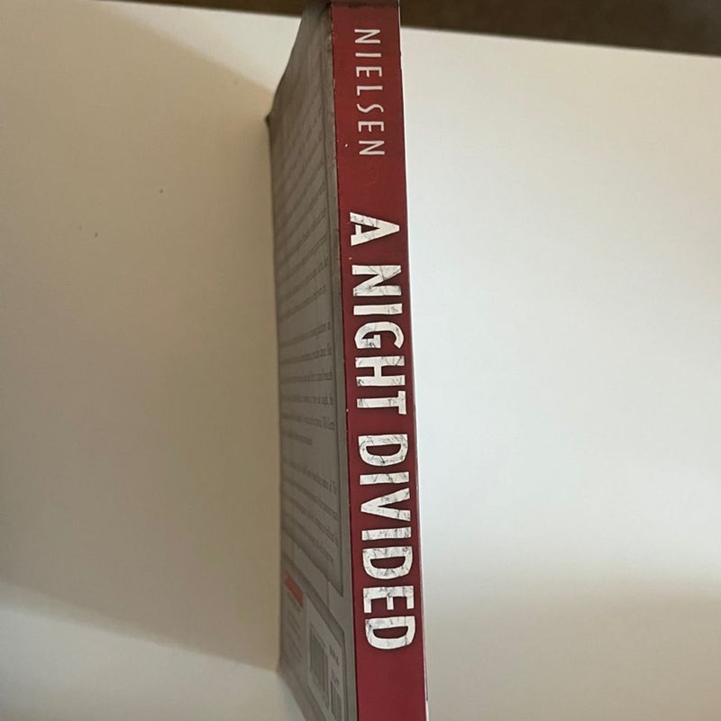 A Night Divided by Jennifer A. Nielsen, Paperback | Pangobooks