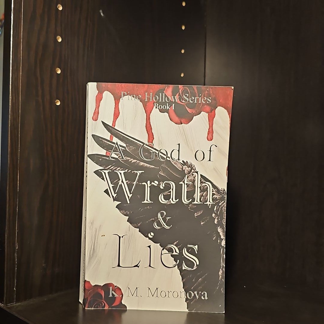 A God of Wrath & Lies by K. M. Moronova