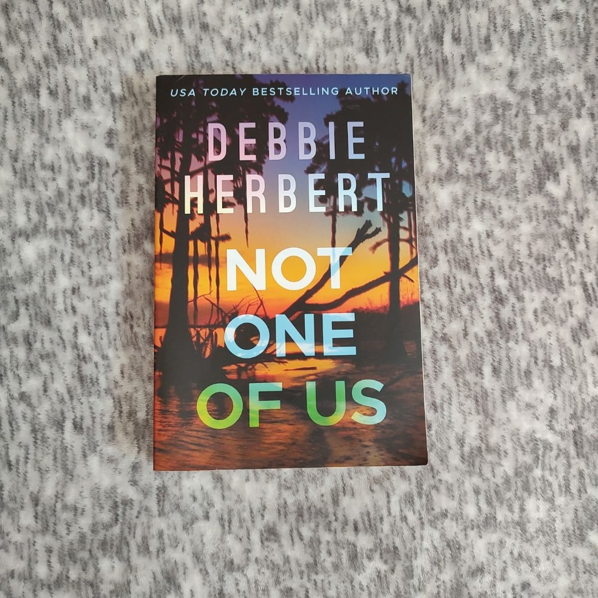Not One of Us by Debbie Herbert