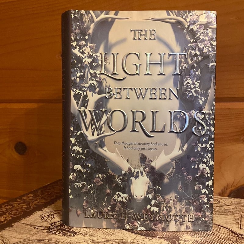 The Light Between Worlds by Laura E. Weymouth, Hardcover | Pangobooks