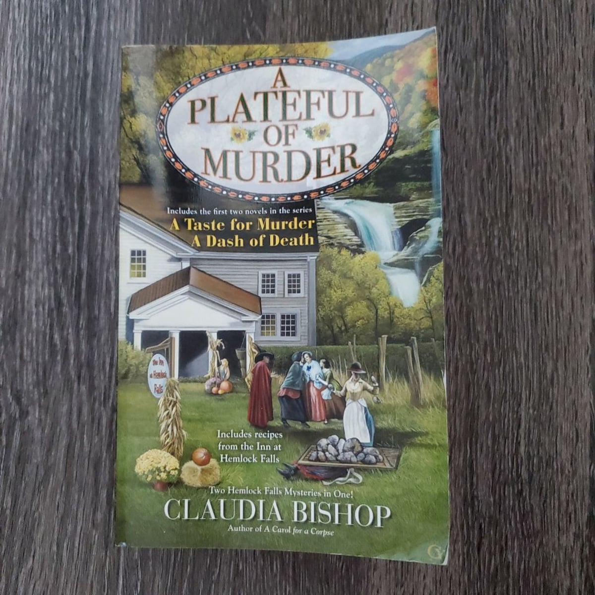 A Plateful of Murder by Claudia Bishop, Paperback | Pangobooks