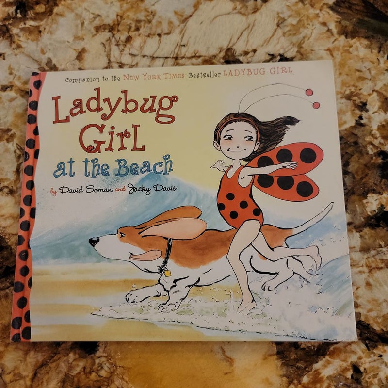 Ladybug Girl at the Beach by Jacky Davis