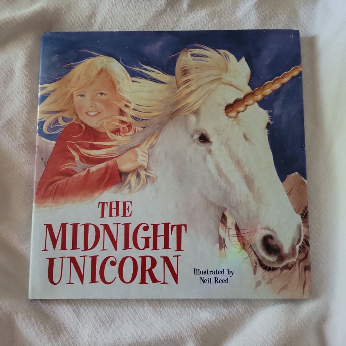 The Midnight Unicorn by Neil Reed