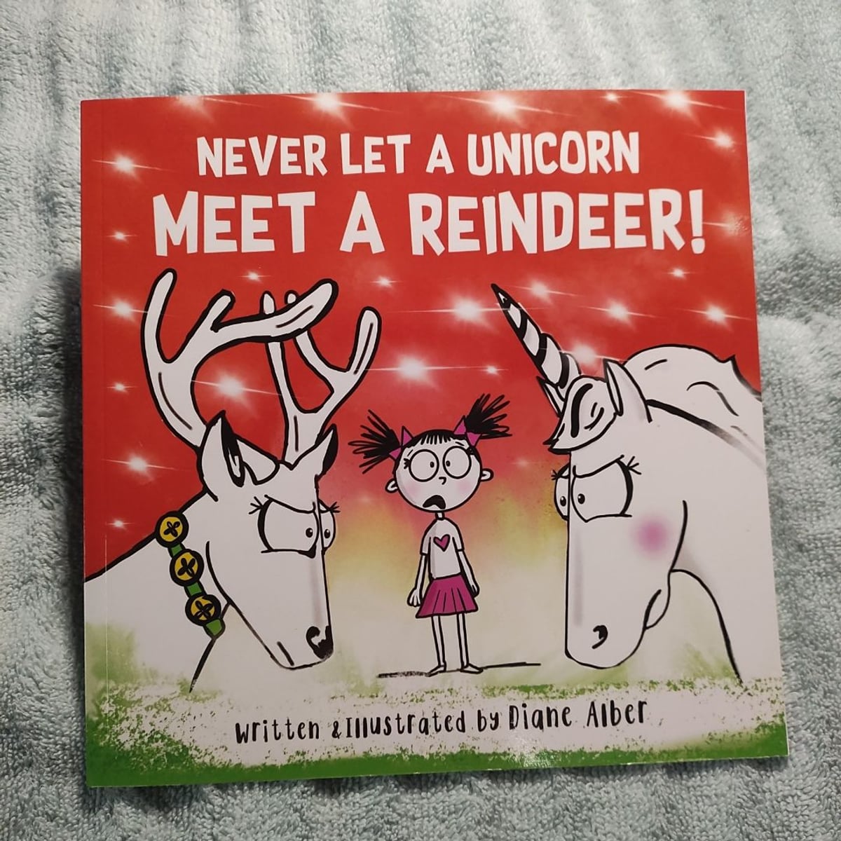 Never Let a Unicorn Meet a Reindeer! by Diane Alber