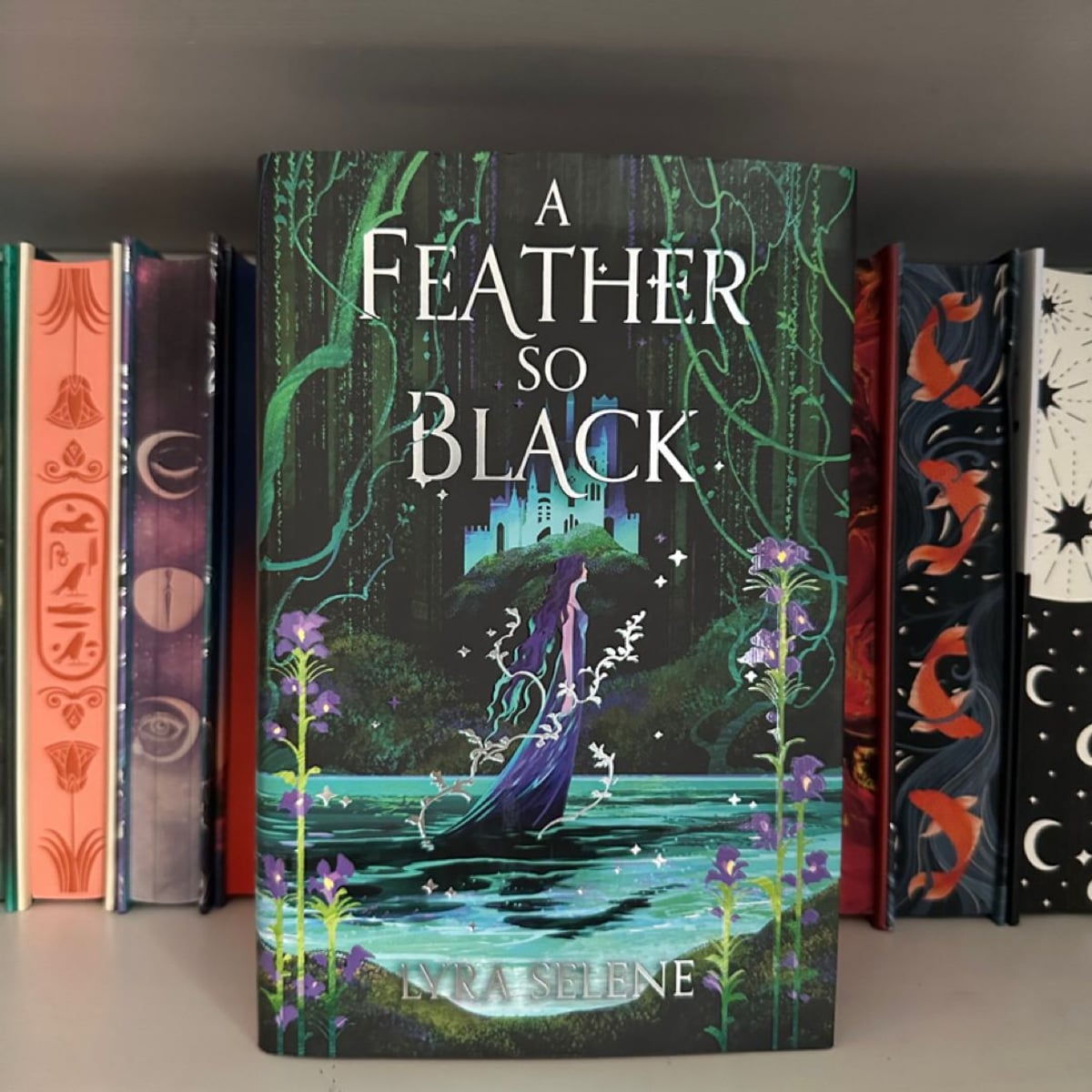 a feather so black (fairyloot) by lyra selene, Hardcover | Pangobooks