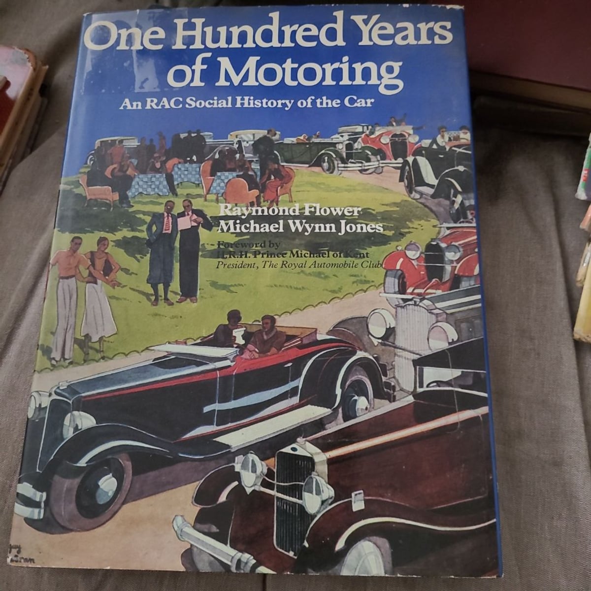 100 Years of Motoring by Raymond Flower, Michael Wynn Jones