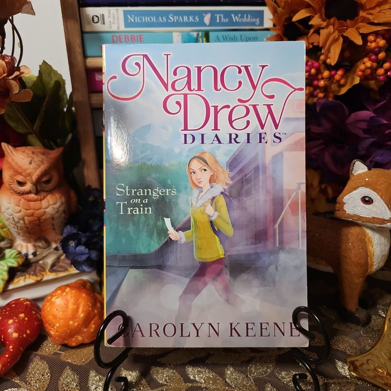 Strangers on a Train by Carolyn Keene