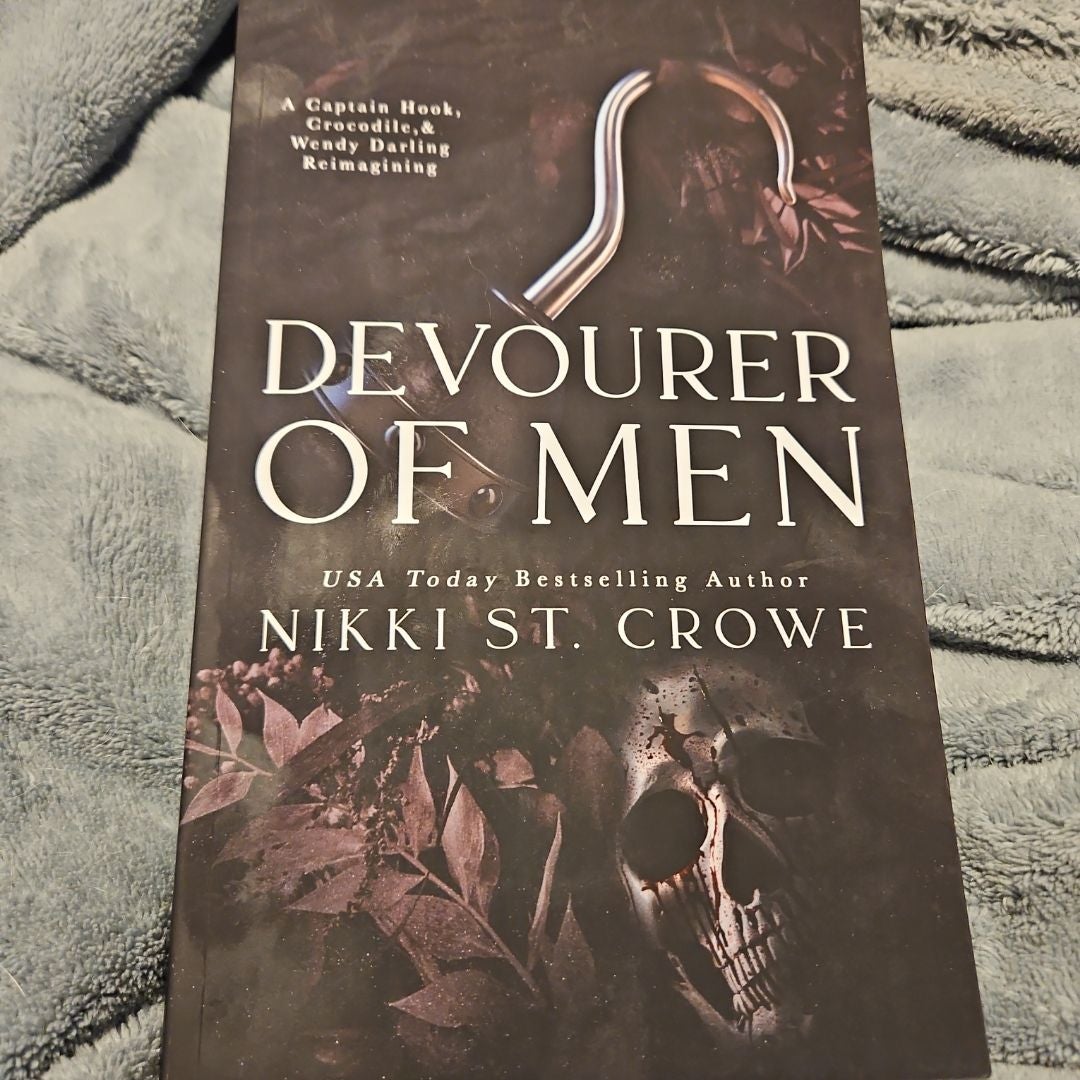 Devourer of Men by Nikki St. Crowe